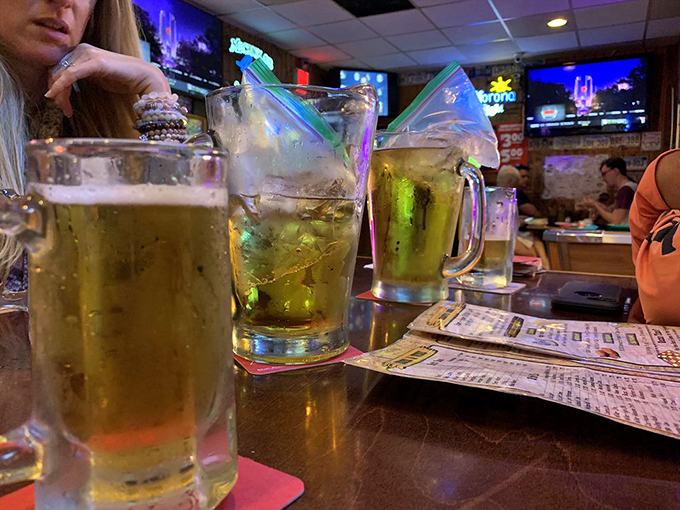 Cold beer in frosty mugs &ndash; civilization's perfect answer to Florida heat and spicy wings. The condensation tells you everything you need to know.