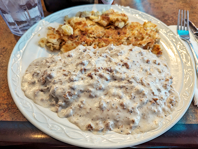 Biscuits and gravy: the breakfast that hugs you from the inside. This plate contains approximately 4,000 calories and zero regrets.