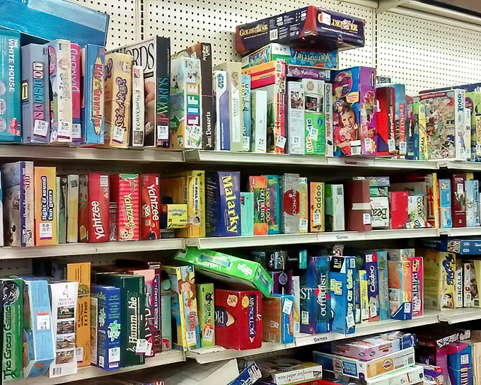 Board game brilliance stacked to the ceiling. Monopoly, Scrabble, and games you forgot existed—family game night will never be the same.