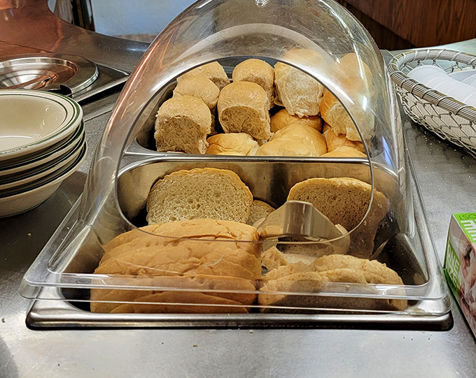 Fresh-baked bread awaits beneath a protective dome, promising that your meal will begin with that most sacred of Midwestern traditions&mdash;carbs done right.