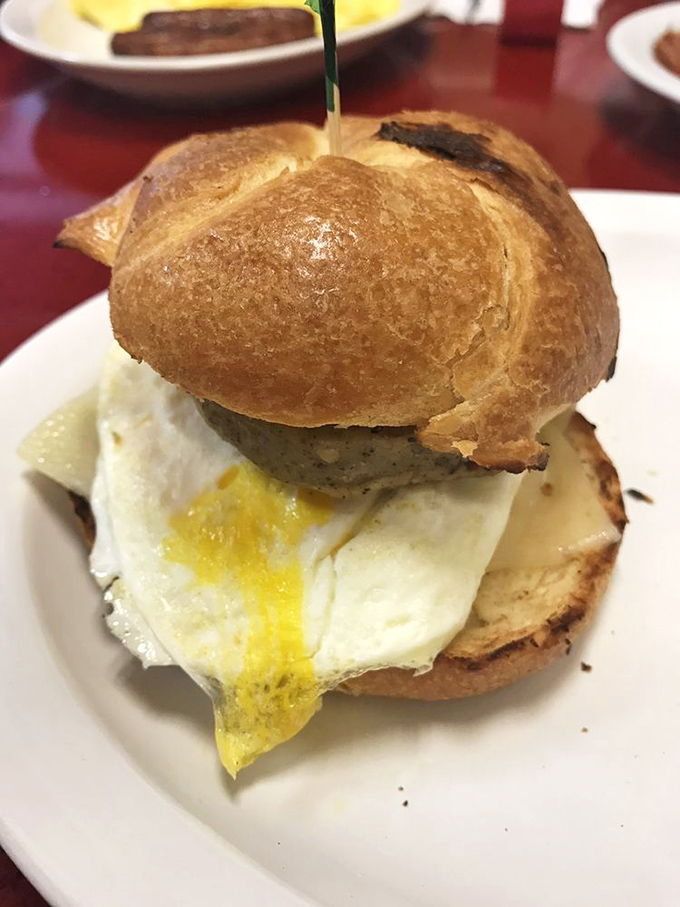 This breakfast sandwich on a toasted brioche bun demonstrates the simple truth that a perfectly cooked egg makes everything better.