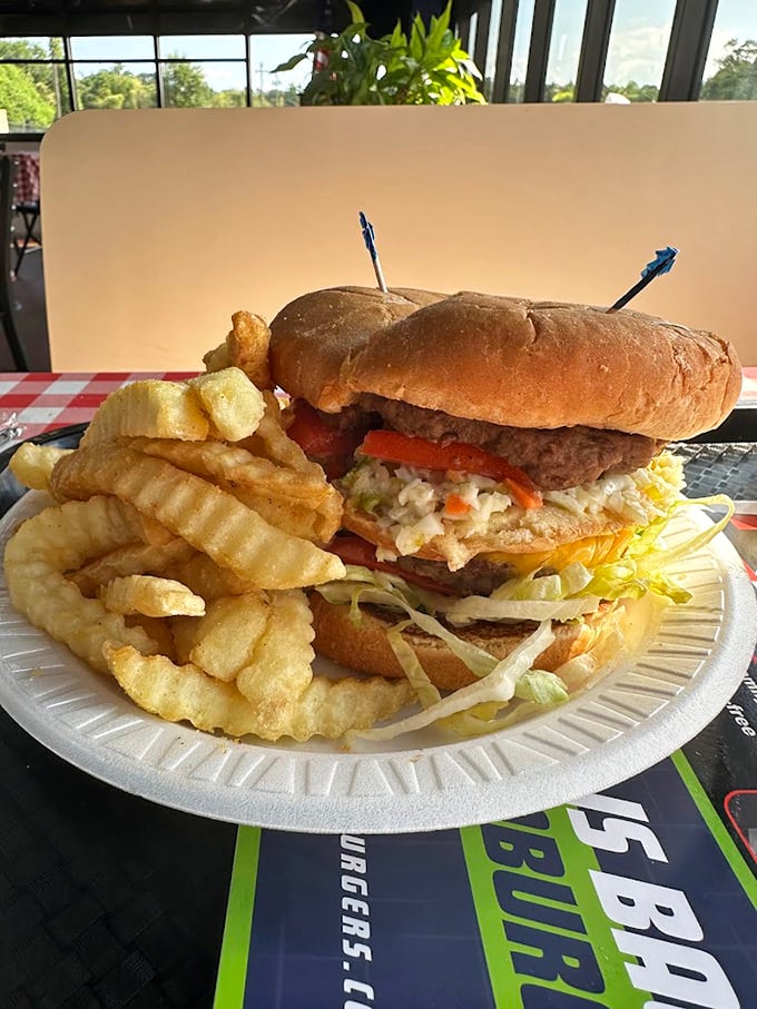 When burgers reach skyscraper proportions, you know you've found a place that understands American appetite architecture.