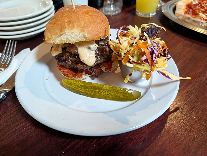 A burger that demands two hands and your full attention—the kind worth driving across county lines for.