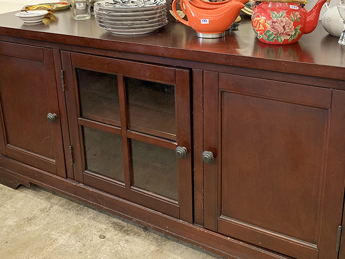 This isn't just a cabinet&mdash;it's a mahogany time machine waiting to transport someone's china collection to its next chapter.