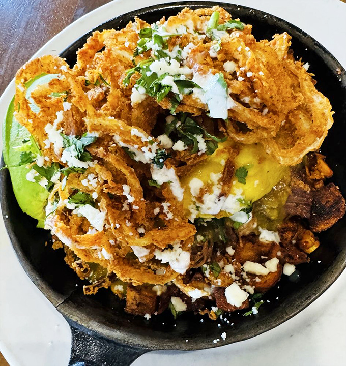 This carnitas hash isn't messing around&mdash;it's what happens when Mexican flavors crash the breakfast party and everyone has a great time.