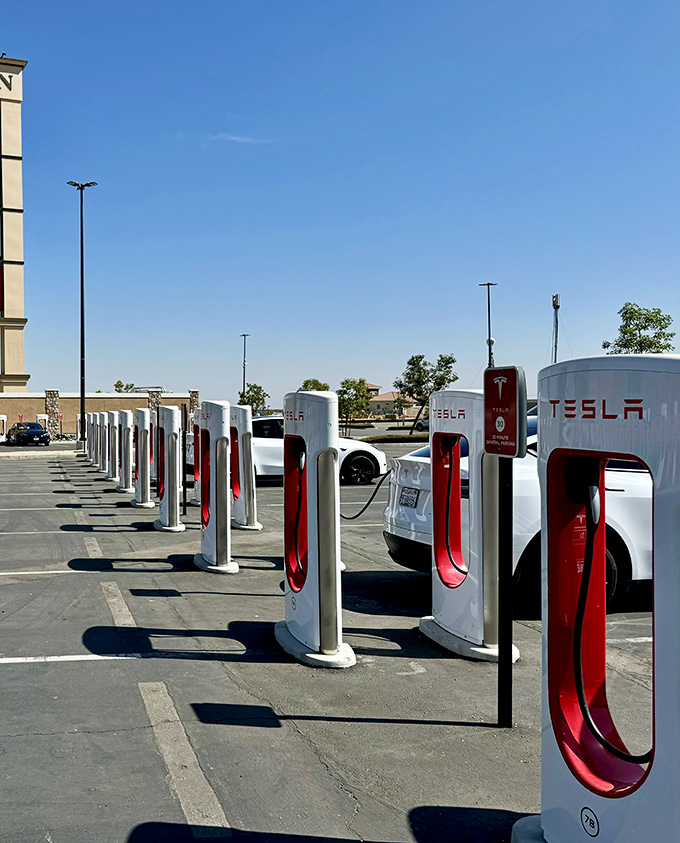 Tesla charging stations prove even your car can shop for energy while you hunt for designer bargains.