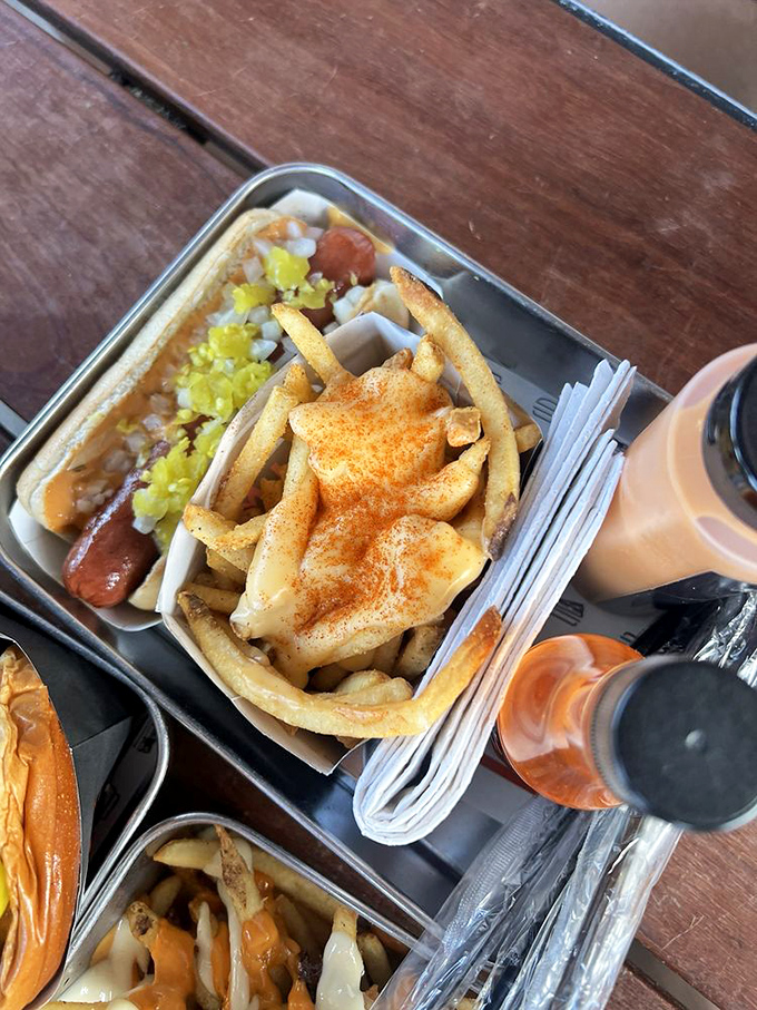 Fries smothered in cheese and beef&mdash;a dish that requires both a fork and a moment of silent appreciation before diving in.