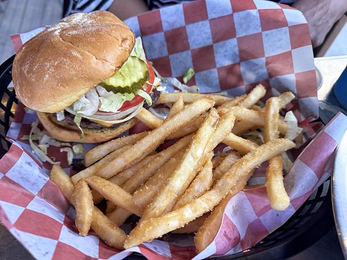This burger isn't just a meal, it's an architectural achievement. The kind of hand-held masterpiece that demands both hands and zero distractions.