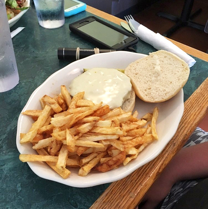 A cheeseburger and fries that remind you why sometimes the classics don't need reinvention &ndash; they just need to be done right, with proper respect.