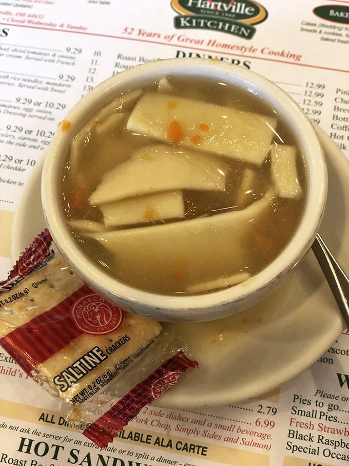 Wide egg noodles float in golden broth with tender chicken - comfort in a bowl when needed most.