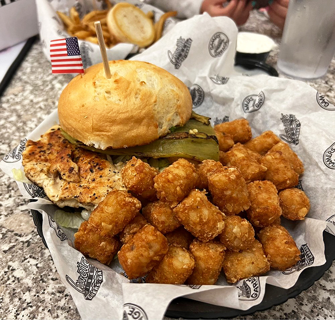 When a sandwich needs its own zip code, you know you're in the right place. Those tots are practically applying for citizenship.