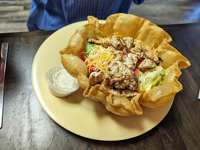 This taco salad in its crispy shell fortress is living its best life, and inviting you to do the same.