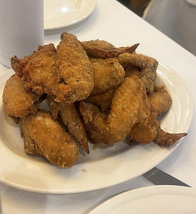 Chicken wings that make you question why you ever bothered with those chain restaurants. These aren't just wings&mdash;they're flavor vehicles with a perfect crunch-to-juicy ratio.
