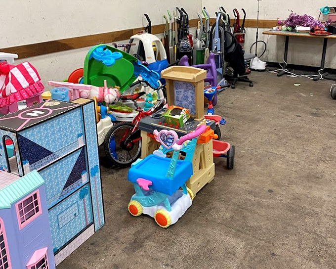 Childhood joy at basement prices. That blue shopping cart and dollhouse combo would have been the envy of every kid on the block.