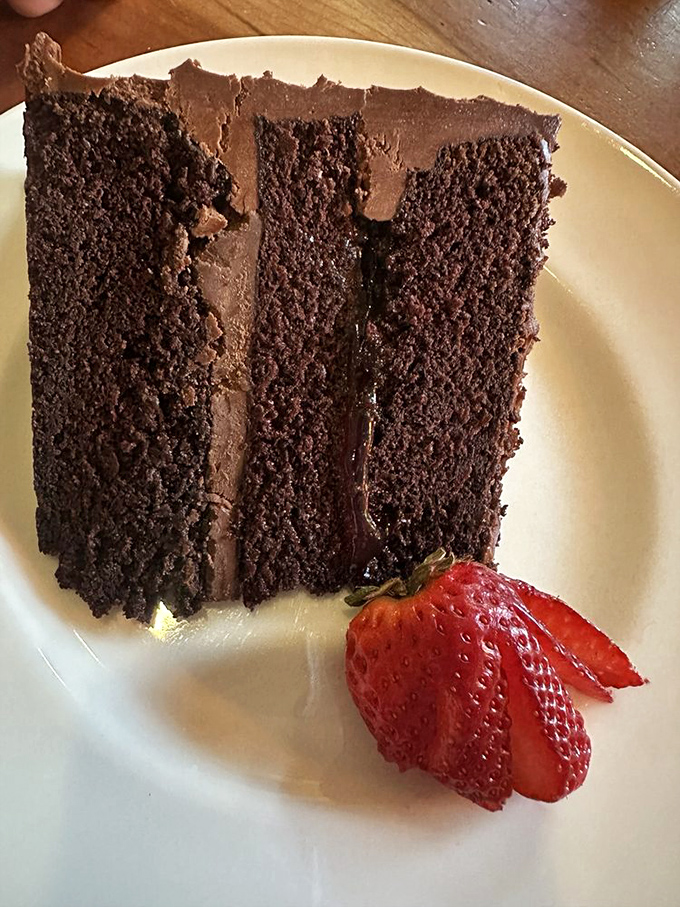 Chocolate cake so rich and decadent it could solve most of life's minor disappointments instantly.