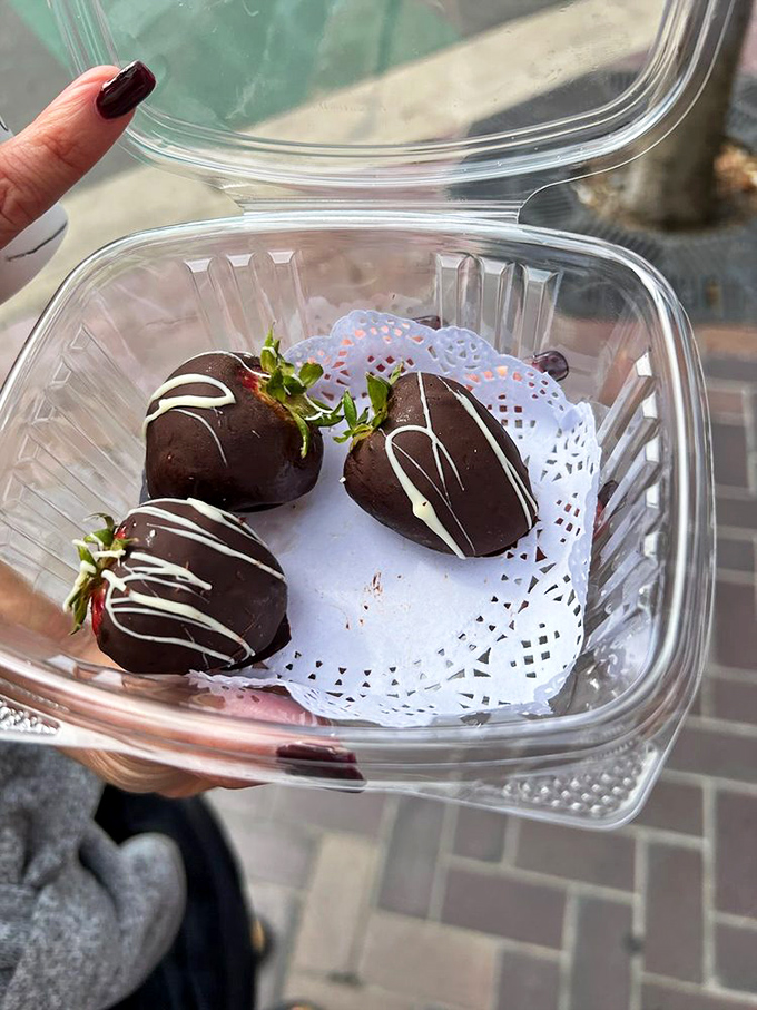 Chocolate-dipped strawberries dressed up like they're attending dessert's red carpet event.