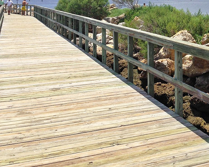 Wooden pathways that invite bare feet and slow strolls. No "hurry" setting exists on Keaton Beach's internal clock.