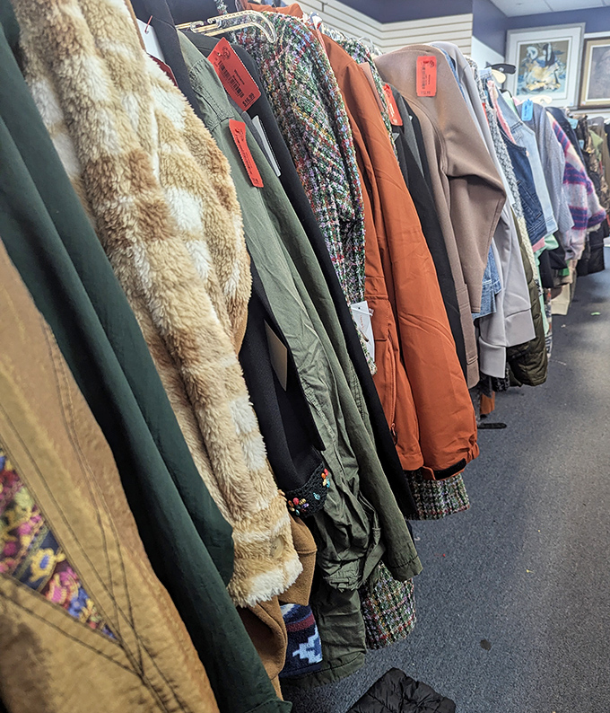 The coat section: where vintage fur mingles with practical parkas, each with stories woven into their fabric. Fashion archaeology at its finest.