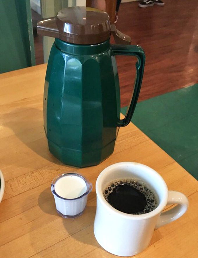 Old-school coffee service with real cream—none of that tiny plastic thimble nonsense. This is how adults start the day.