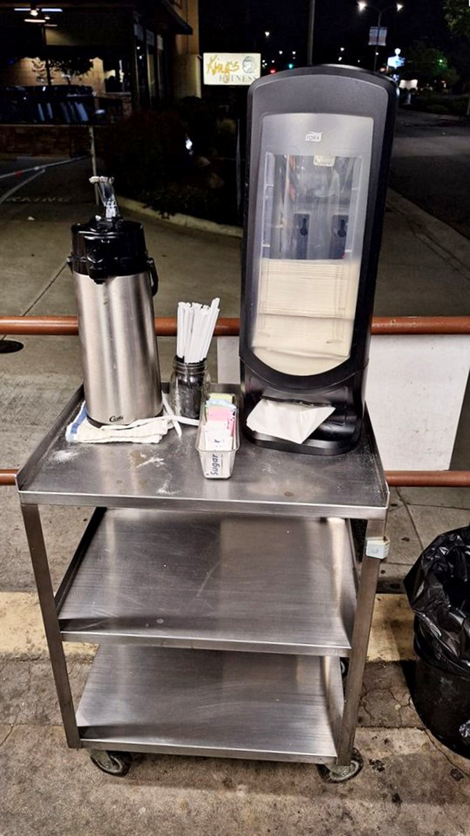 Even in the wee hours, this outdoor coffee station stands ready for night owls and early birds seeking liquid fortification.