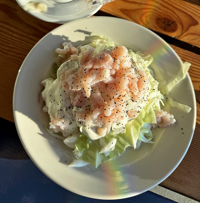 This isn't your average coleslaw&mdash;it's a refreshing cabbage canvas topped with delicate bay shrimp and a dressing worth bottling.