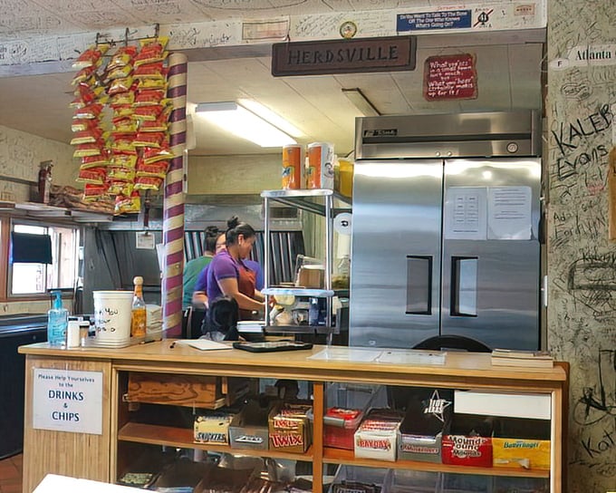 The counter at Herd's isn't just where orders happen&mdash;it's command central for burger operations, with chips hanging like stalactites of salty goodness.