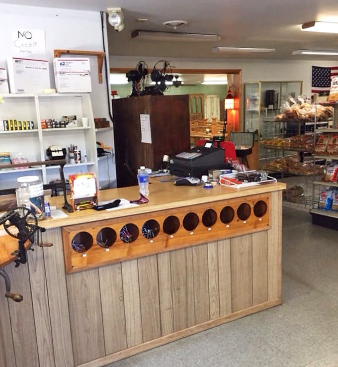 The rustic wooden counter welcomes hungry travelers like an old friend. Part country store, part restaurant—all heart in this multi-purpose hub of rural hospitality.