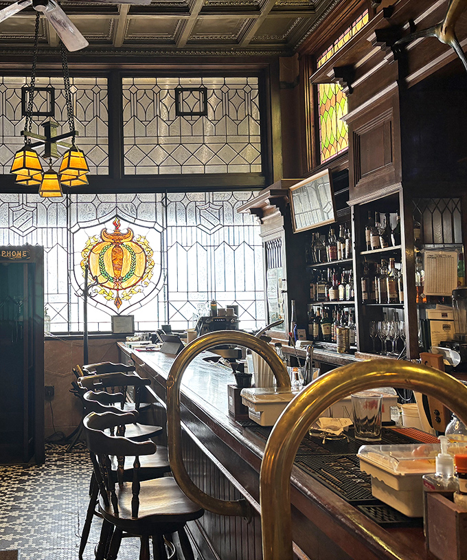 A bar that's seen it all, with stained glass that tells stories and stools that have supported generations of elbows, conversations, and celebrations.