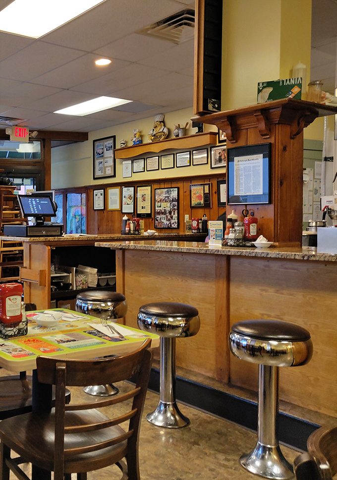 Classic counter seating where breakfast magic happens before your eyes &ndash; the best seats in the house for serious eaters.