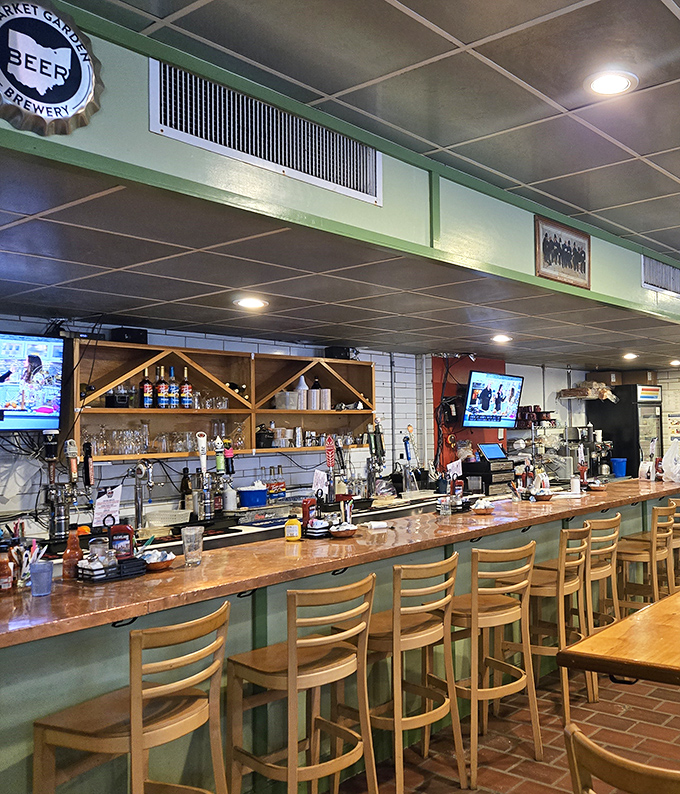 The bar area strikes that perfect balance between "neighborhood watering hole" and "I might spot a local celebrity nursing a Bloody Mary" vibes.
