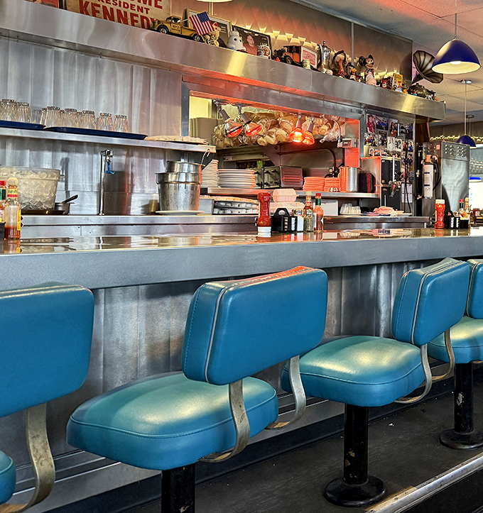 Counter seating: where solo diners become part of the diner family and the kitchen ballet is your entertainment.