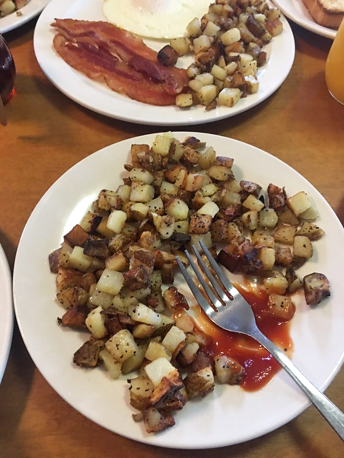 These aren't just potatoes; they're golden cubes of comfort that understand the true meaning of breakfast happiness.