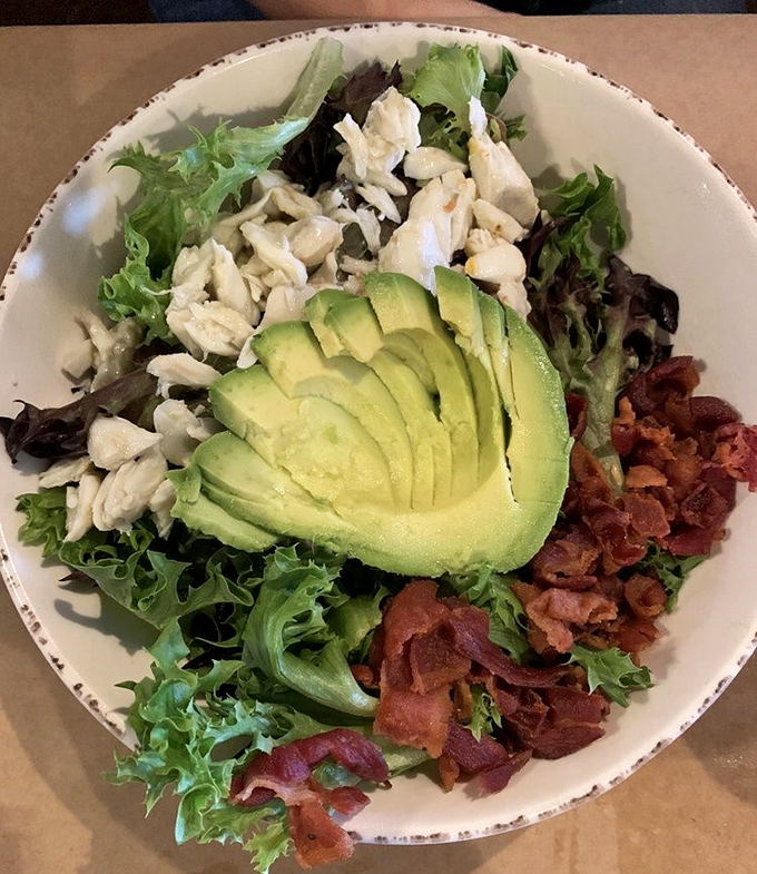 This crab and avocado salad proves that "healthy" and "indulgent" aren't mutually exclusive terms. The bacon is just showing off at this point.