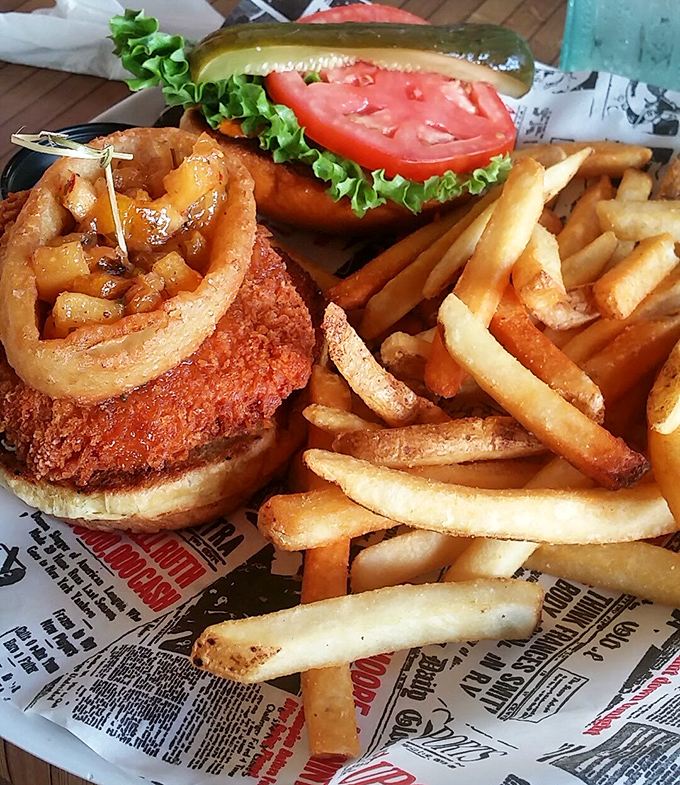 This crab cake sandwich isn't messing around &ndash; crispy exterior, tender inside, and those fries look like they're auditioning for a food magazine cover.