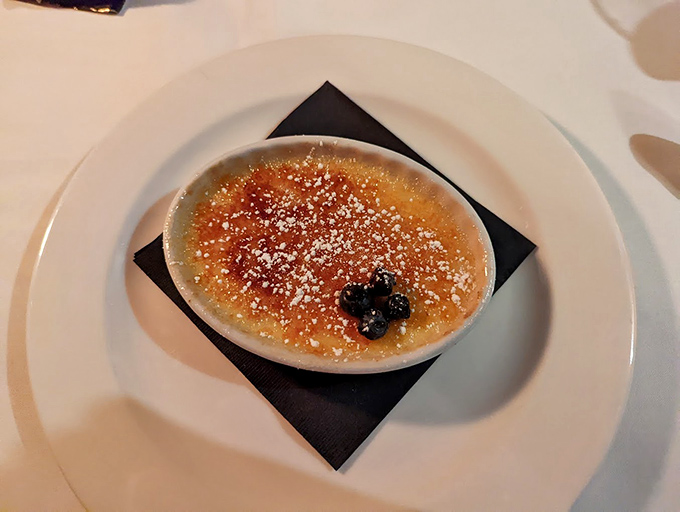 A cr&egrave;me br&ucirc;l&eacute;e with a crackling sugar top that shatters with satisfying drama, revealing the silky custard treasure beneath.