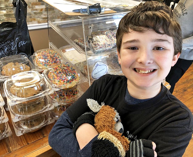 The display case of sweet temptations makes choosing dessert the day's most delightful dilemma. Even the youngest customers approve.