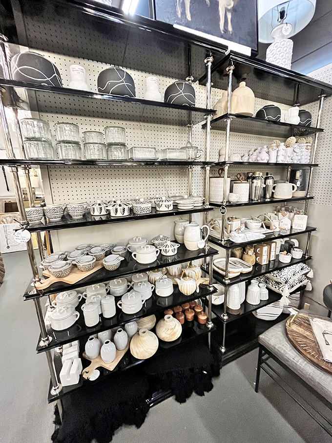 Monochromatic heaven for the kitchen connoisseur. These shelves of black and white ceramics prove that sometimes less color means more style.