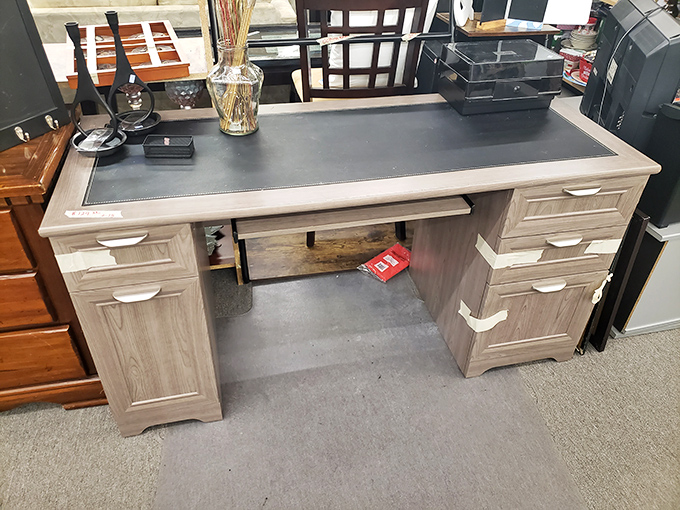 Office elegance meets bargain hunting&mdash;this desk has seen spreadsheets and now seeks a new home office to grace with its presence.