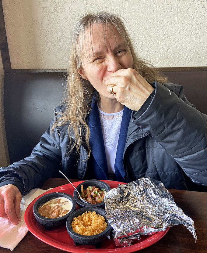 Every great meal comes with great company. This diner knows the universal truth: food tastes better when you're practically inhaling it with enthusiasm.