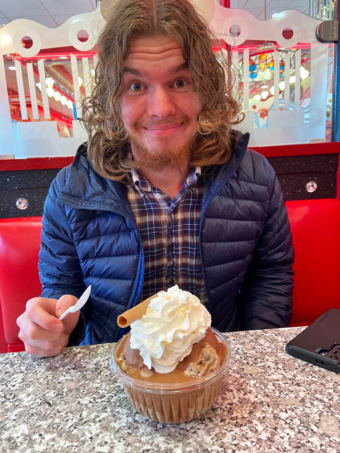 That face says it all &ndash; the universal expression of "I've found my happy place" that transcends language. Ice cream enlightenment achieved.