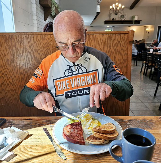 Every small town needs a breakfast hero, and this cyclist has found his. The focused determination of a man who knows exactly what good food is worth.