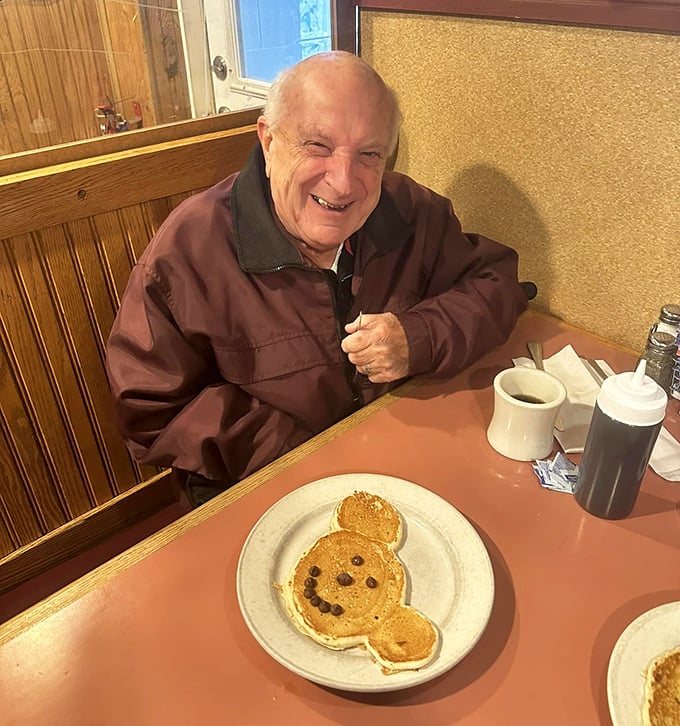 Pure joy is a Mickey Mouse pancake that makes grown adults smile like they're five years old again.