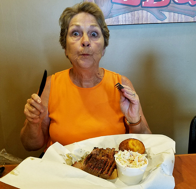 Even the happiest customers can't hide their excitement when BBQ this good is involved.