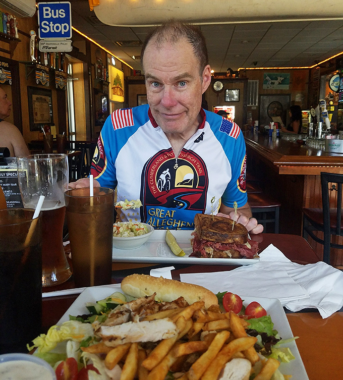 Cyclists and food lovers unite at The Trailside, where trail stories are exchanged over sandwiches that require both hands and several napkins.