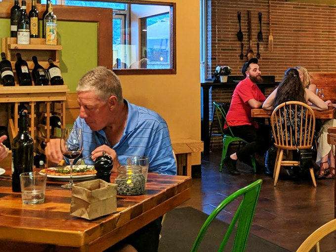 The dining room hums with that perfect restaurant energy&mdash;intimate enough for conversation, lively enough to feel like you're somewhere special.