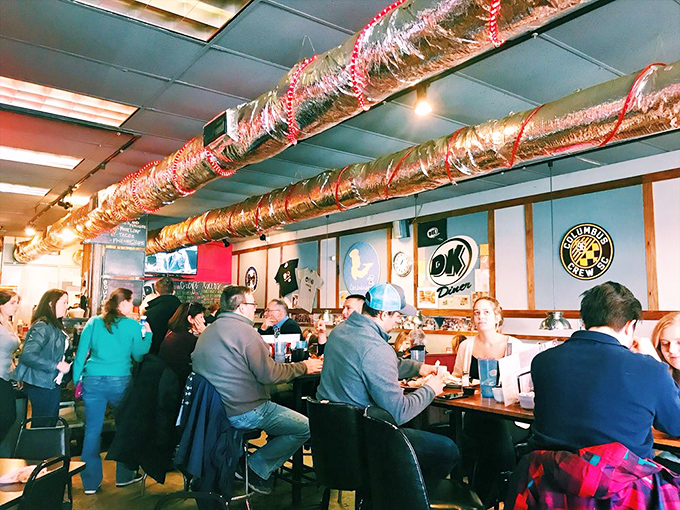 The symphony of breakfast in full swing&mdash;clattering plates, murmured conversations, and the collective joy of people who understand that calories don't count before 11 AM. 