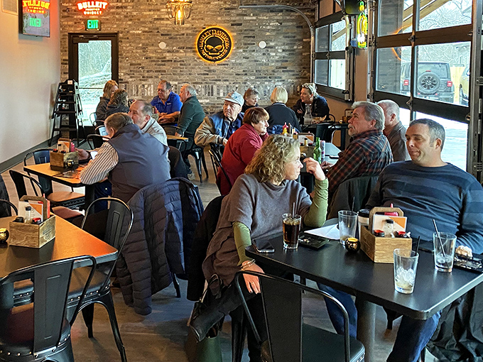 Where strangers become neighbors over shared tables. The bustling dining room captures that magical Wisconsin alchemy of food and fellowship.