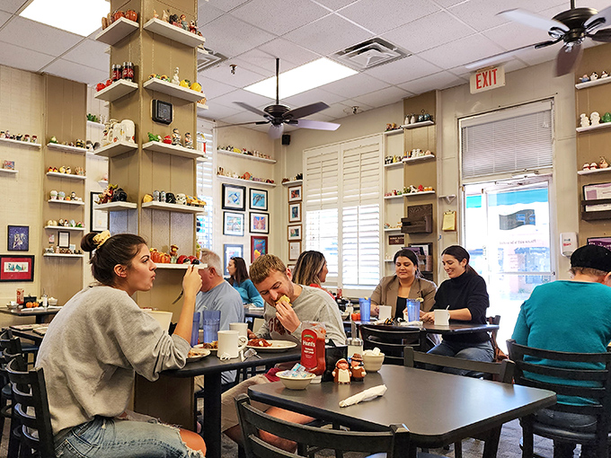 The true measure of a great breakfast spot: happy diners lost in conversation, surrounded by quirky décor and the promise of refills.
