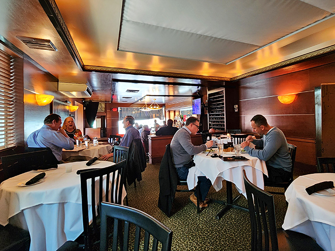 Business lunches and romantic dinners coexist in Johnny's warm glow, where deals and proposals are equally likely outcomes.