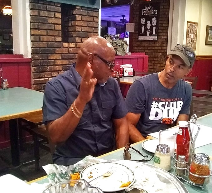 Where serious food conversations happen &ndash; these gentlemen know that the best debates are fueled by excellent pizza and perhaps a burger or two.